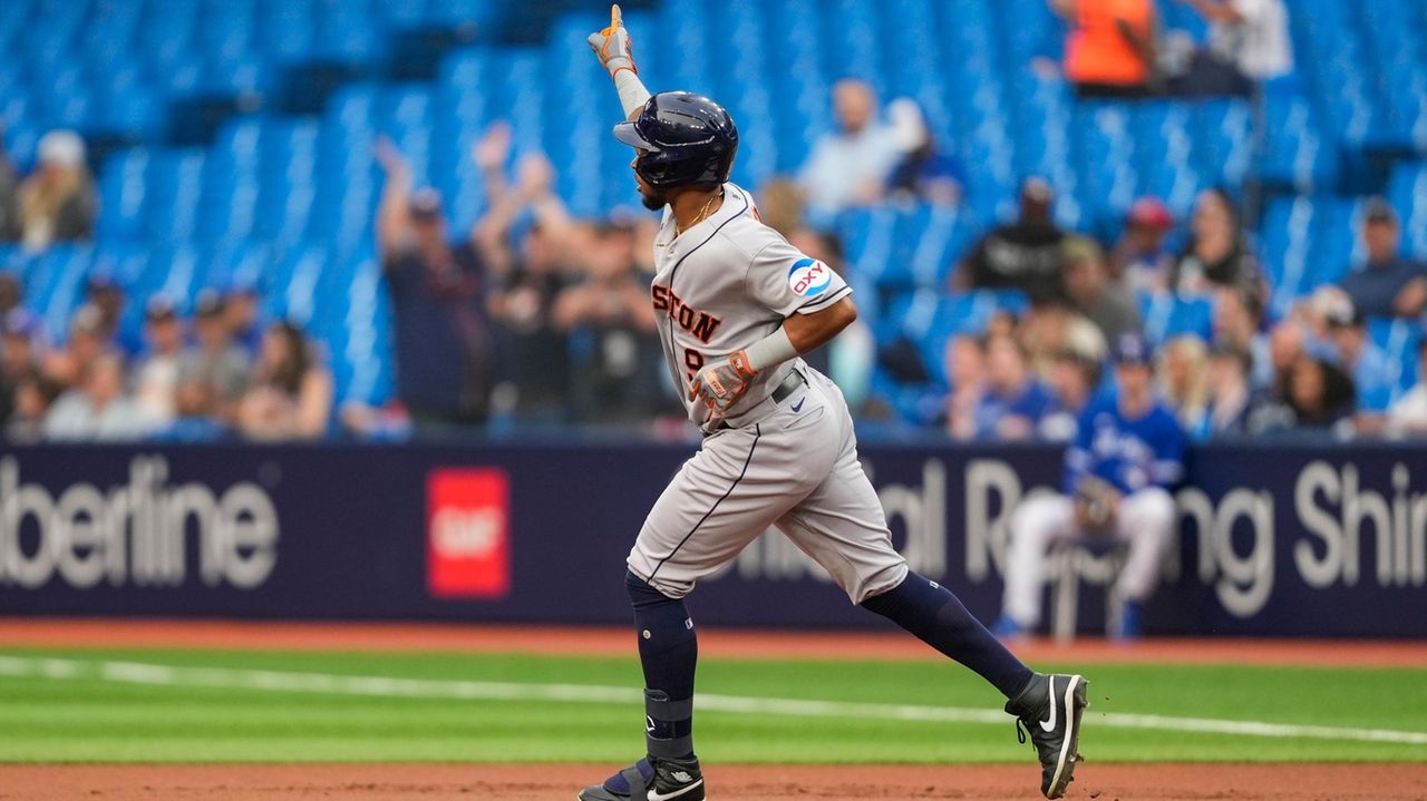 Julks hits 1st slam, surging Astros homer four times in 11-4 win over ...
