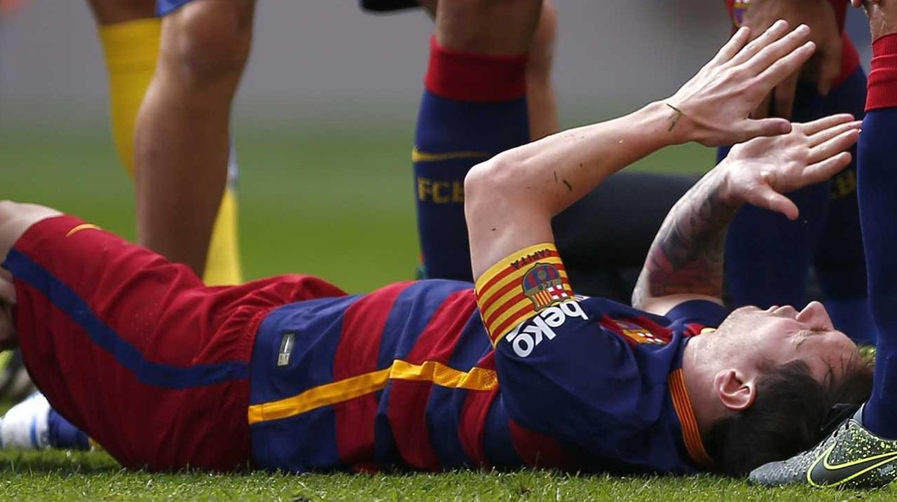 Lionel Messi out two months after tearing ligament in left knee - Newsday
