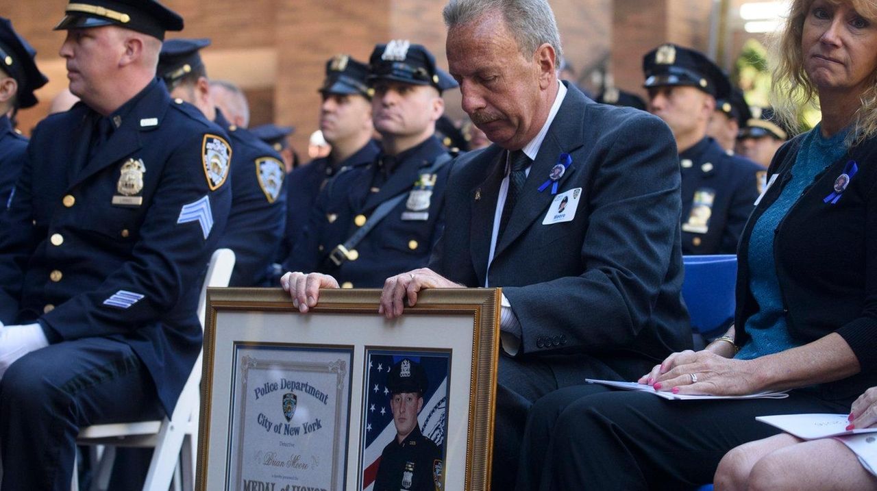 NYPD awards Det. Brian Moore posthumously with highest honor - Newsday
