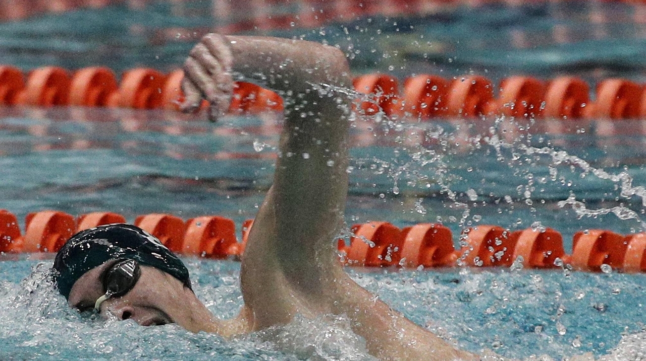 Garden City's Newmark again sets pace in swimming prelims - Newsday