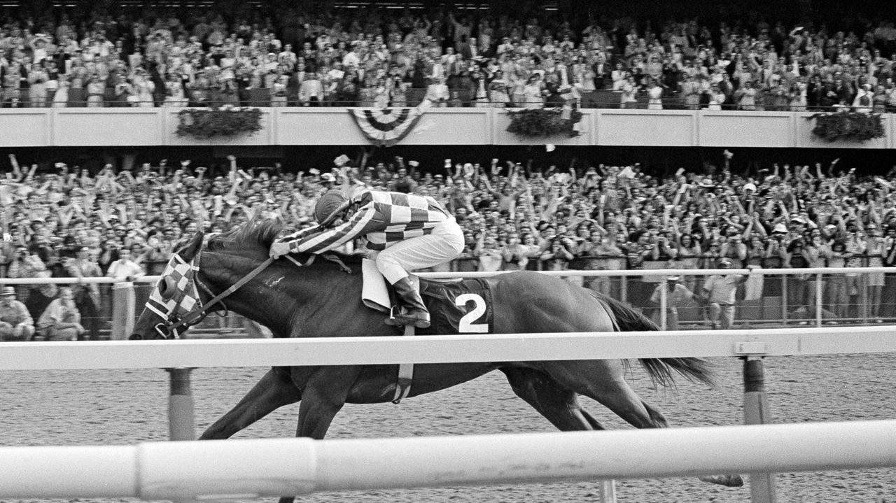 Secretariat's record-setting Belmont Stakes win to claim the Triple ...