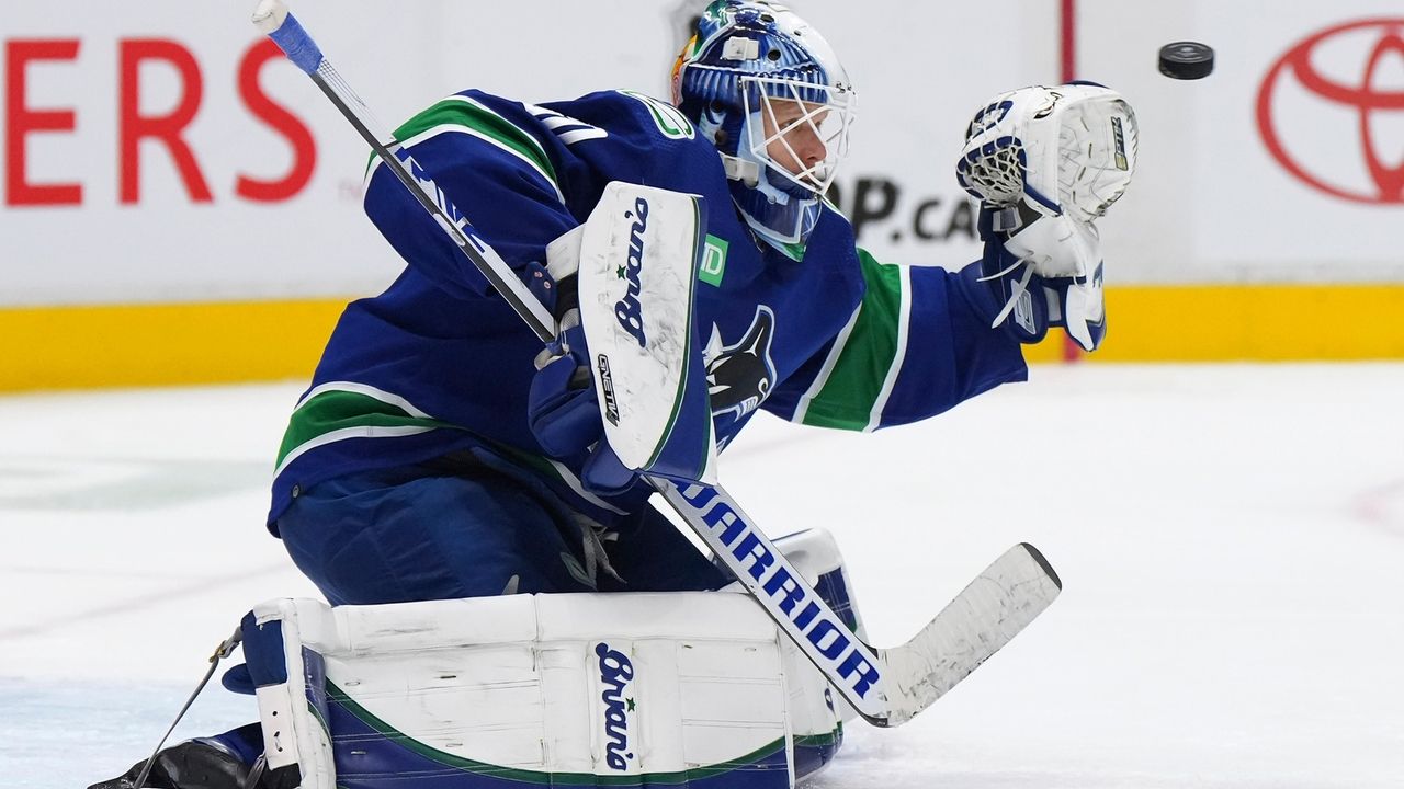 Andrei Kuzmenko scores twice, Canucks beat Avalanche 4-2 - Newsday