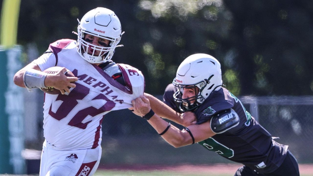 Photos: Mepham vs. Elmont football - Newsday