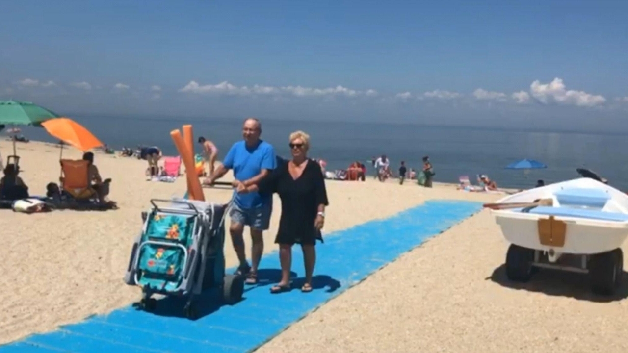 Mats help those with disabilities visit Smithtown beaches - Newsday