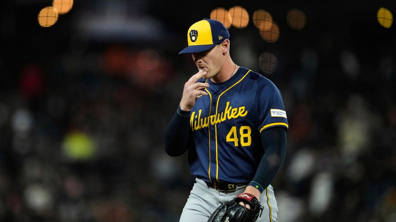 Brewers send right-hander Craig Yoho to minors while calling up Elvin ...