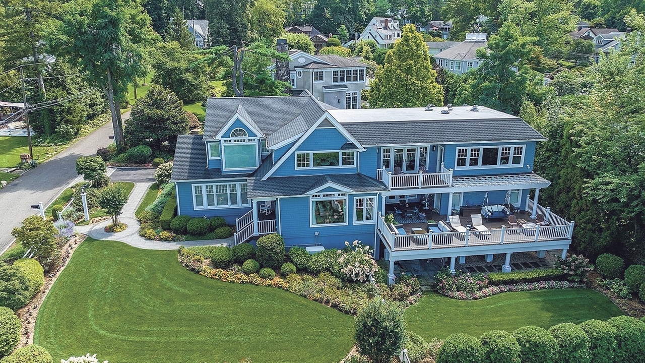 Huntington Bay home one house away from the water lists for $2.6 ...