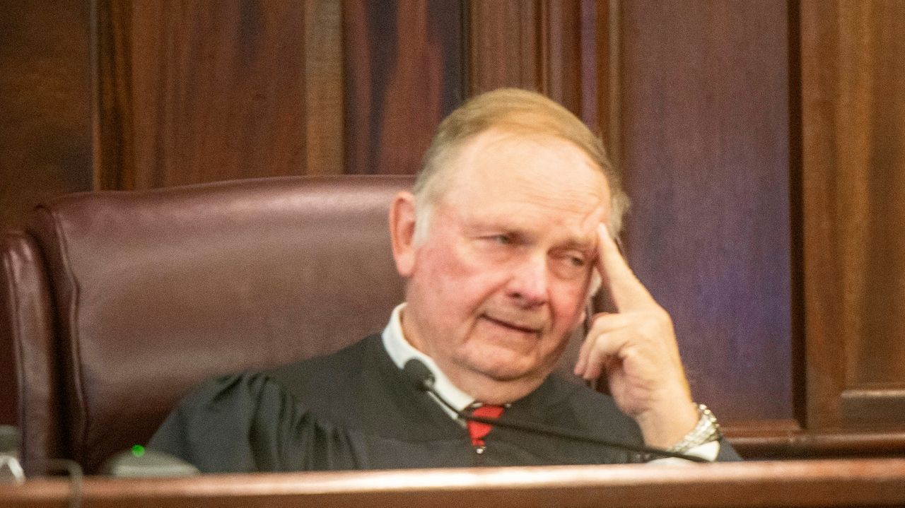 Judge orders acquittal of ex-prosecutor on 1 of 2 counts in misconduct trial over Ahmaud Arbery ...