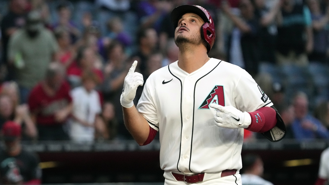 Arenado's grand slam in the 1st inning helps power the Diamondbacks to ...