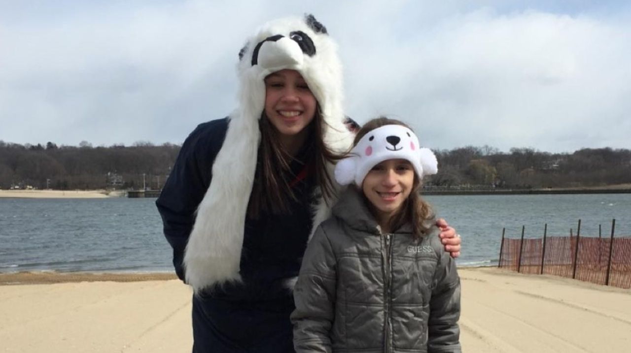 Swimmers trade indoor pool for frigid plunge in North Hempstead - Newsday