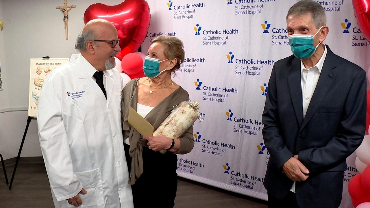Smithtown couple reunited with neurosurgeon who saved both after crash ...