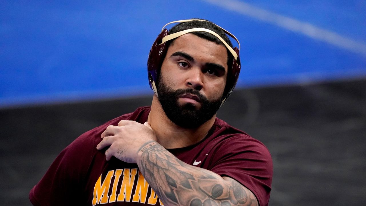 Tokyo wrestling gold medalist Gable Steveson balancing 2024 Olympic ...