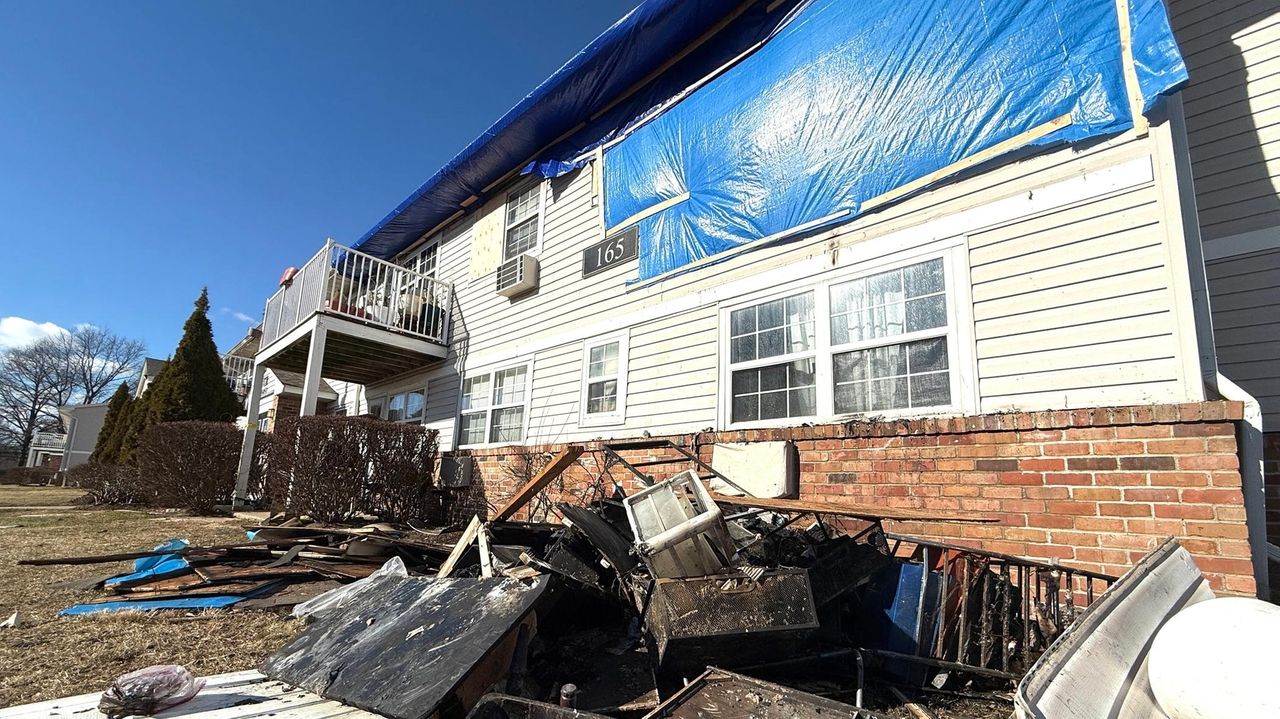 Evacuees await word on return after fire at Central Islip apartment ...