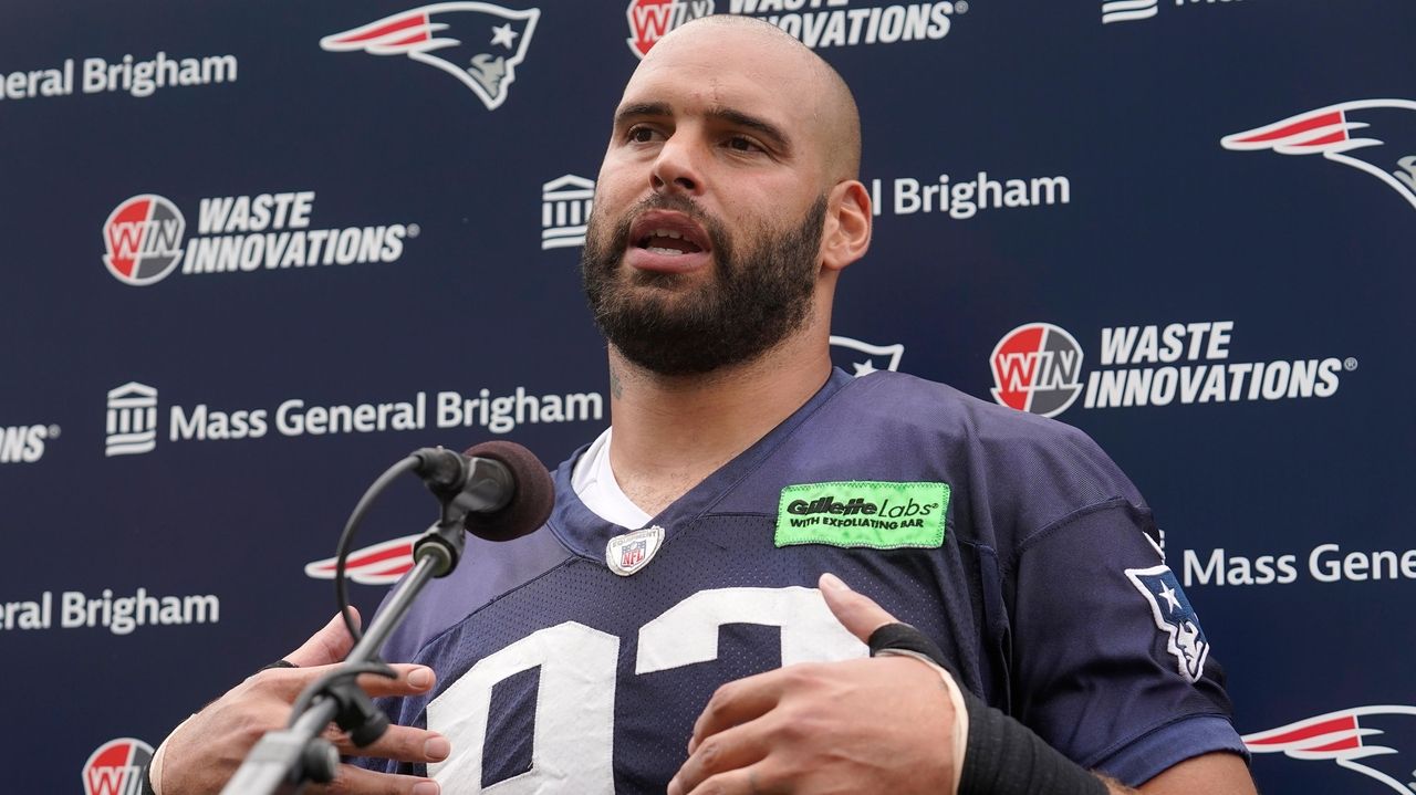 Patriots' Lawrence Guy on the field at training camp amid ongoing ...