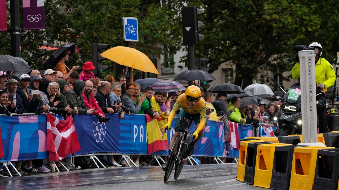 Grace Brown of Australia wins the Olympic time trial over the rainy ...