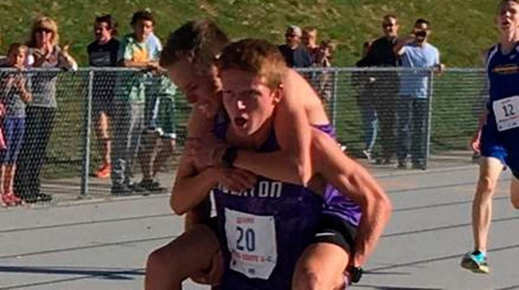 Utah runner carries injured teammate across the finish line - Newsday