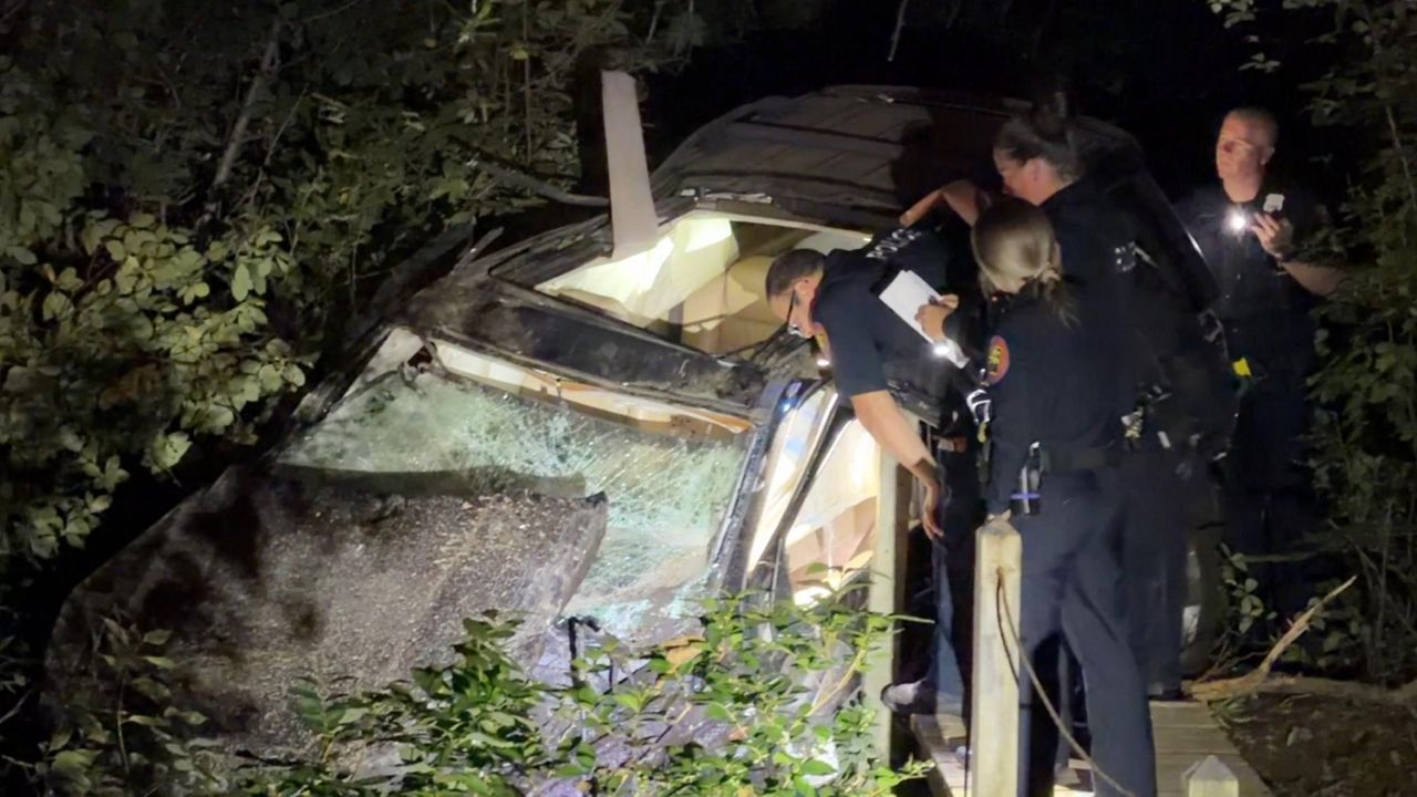 Car crashes into creek at Twin Lakes Preserve in Wantagh - Newsday