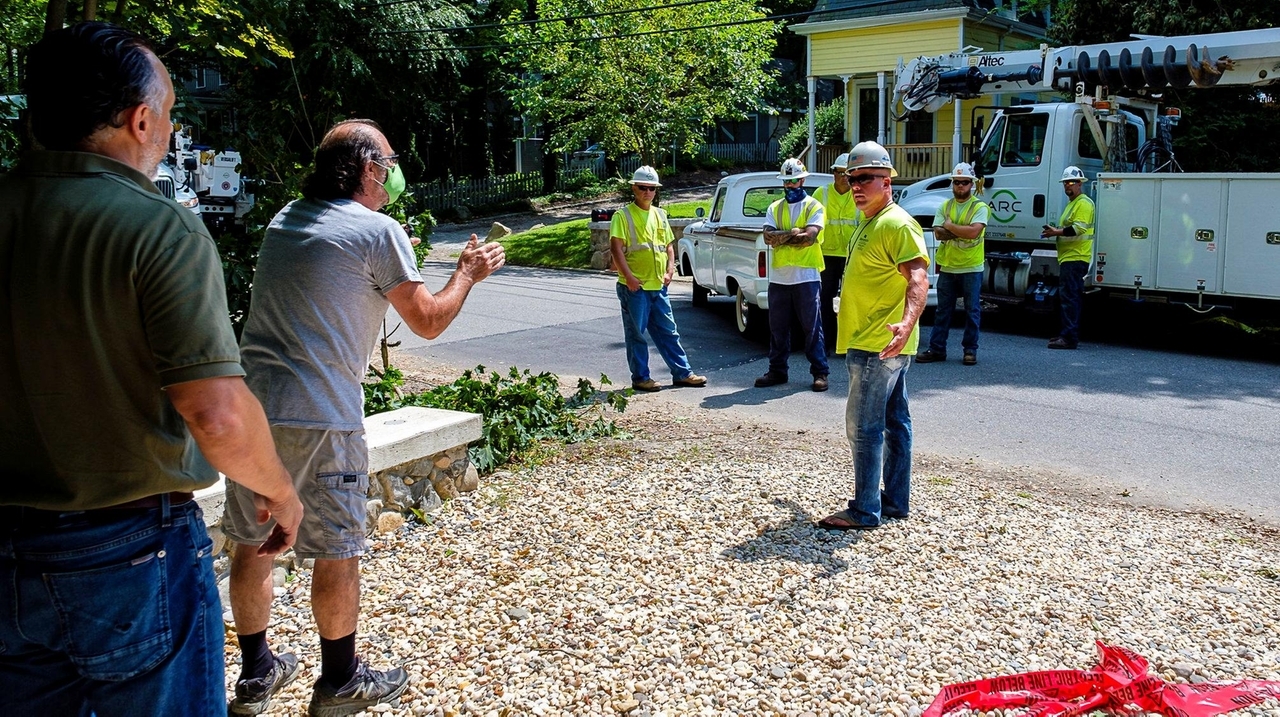Blocking in PSEG trucks, LI man demands power restoration to home - Newsday