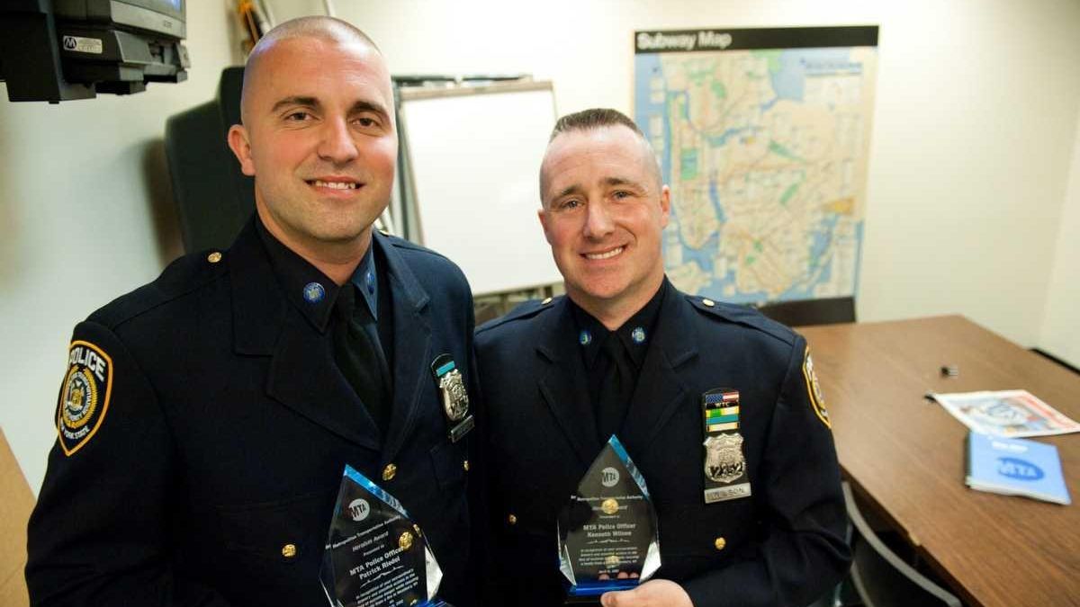 MTA cops honored for rescuing 3 from fire - Newsday