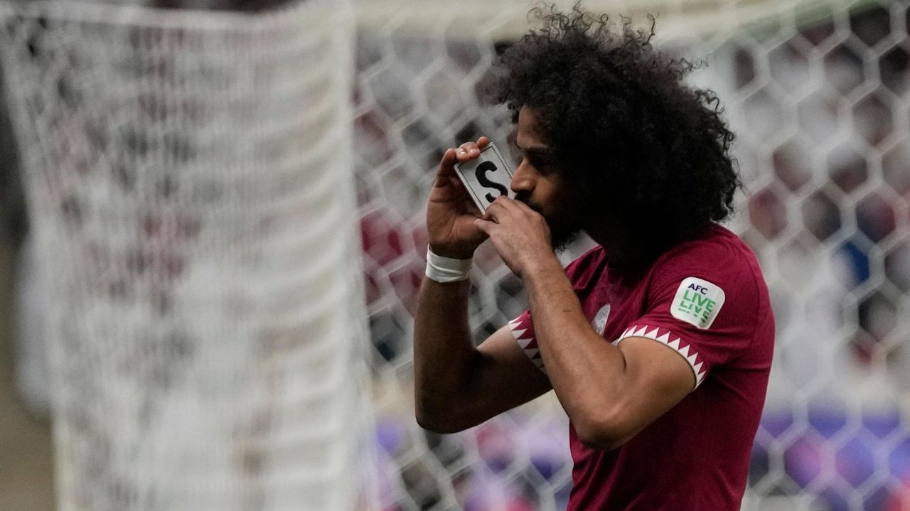 Qatar's Akram Afif produces close-up magic trick during goal ...