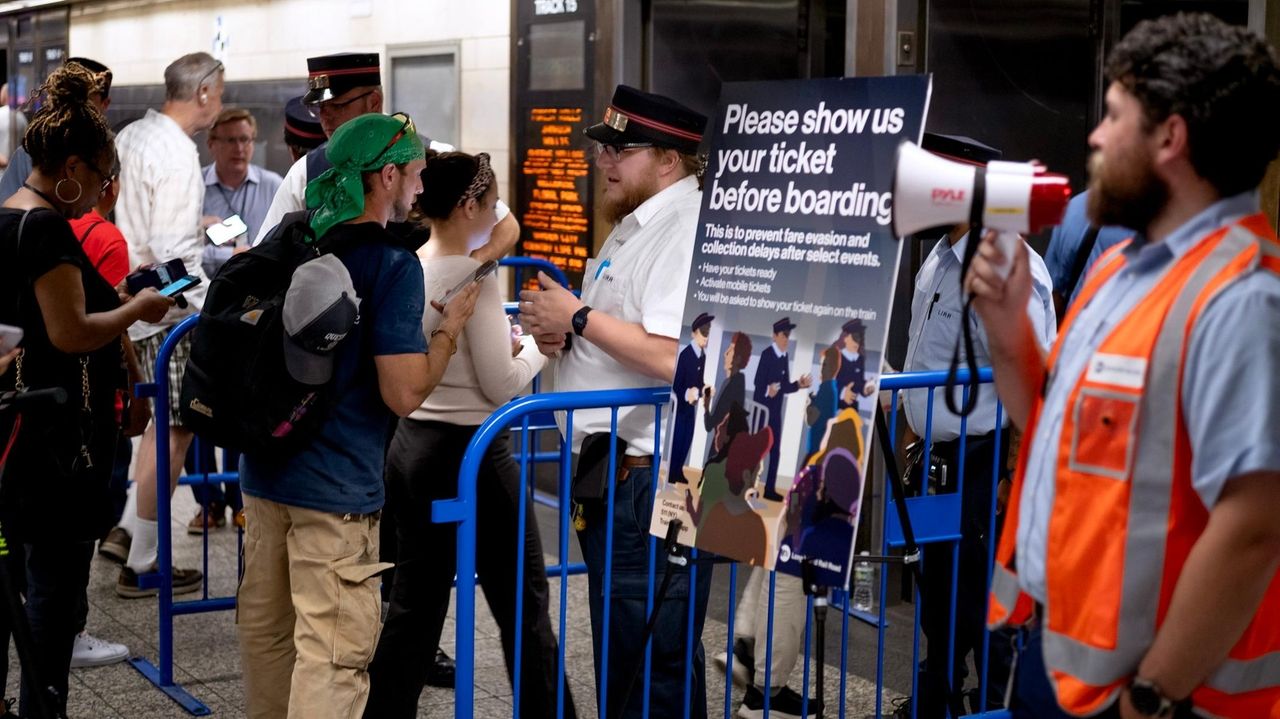 LIRR checking tickets before boarding during Penn Station evening rush ...
