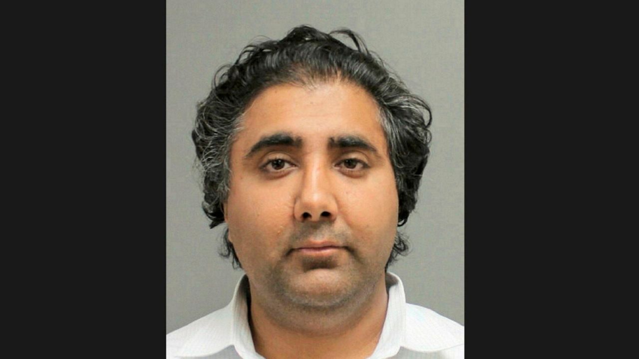 Cops: Nassau Asian affairs deputy charged with assaulting boy, 10 - Newsday