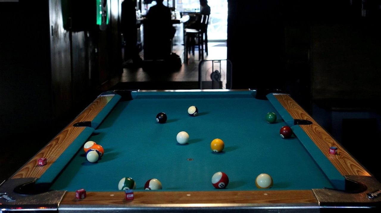 Judge says pool halls that sued state can reopen immediately - Newsday