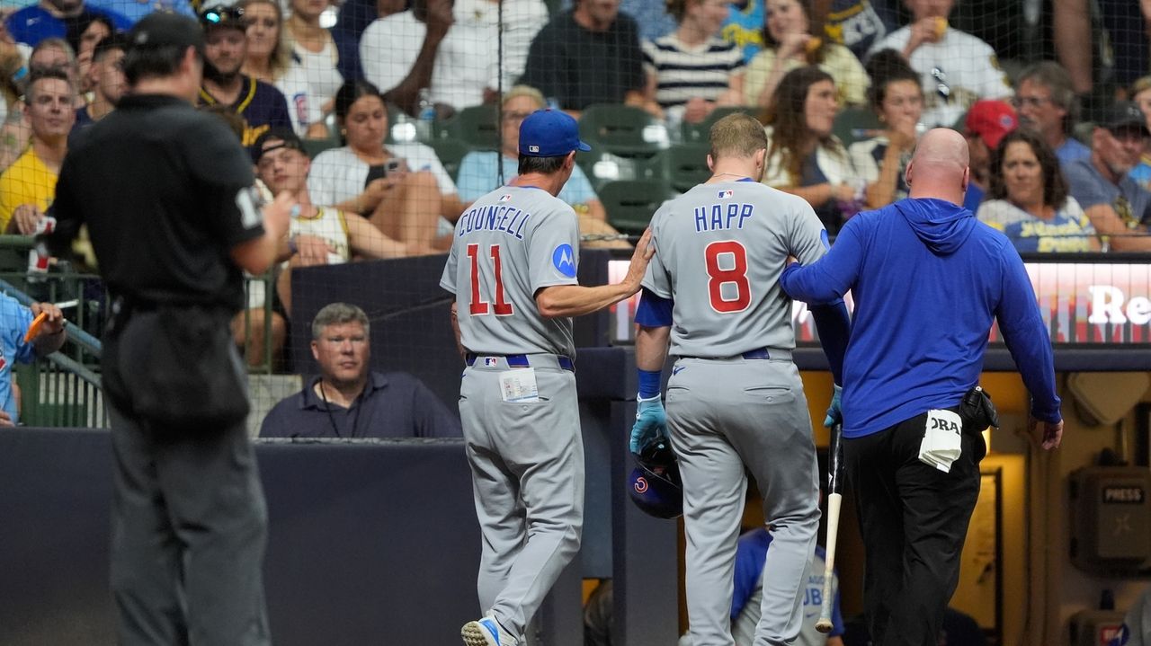 Cubs' Happ leaves game after fouling ball off his shin and feeling ...