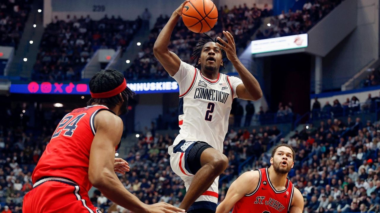 Johnson and Newton lead No. 5 UConn to a 69-65 win over St. John's in ...
