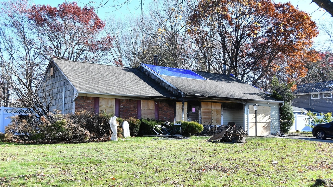 Neighbor set fire to Coram house, gutting it, police say - Newsday