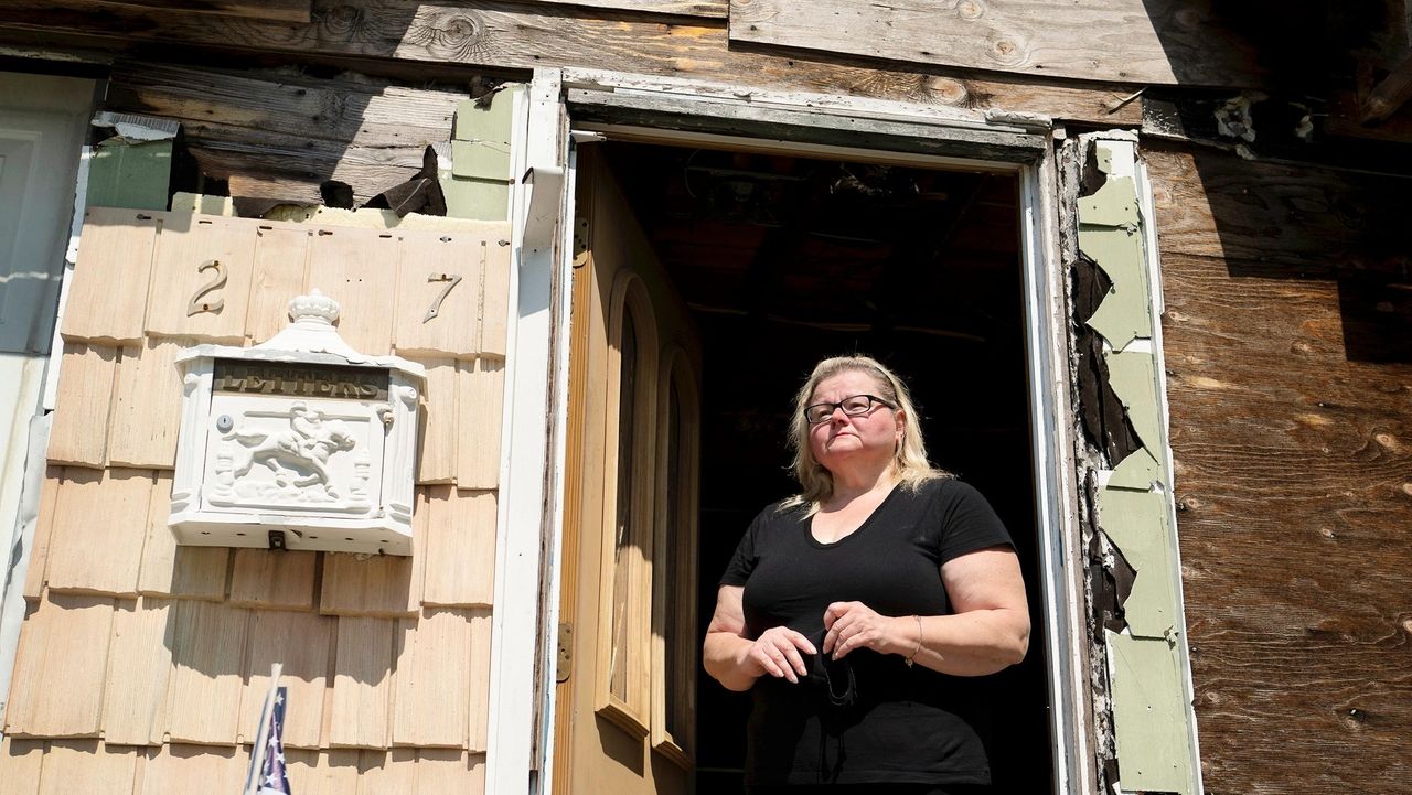 Hicksville woman battles to keep flood-damaged home due for demolition ...