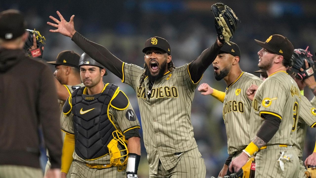 Padres turn triple play to clinch playoff spot with 4-2 win over ...