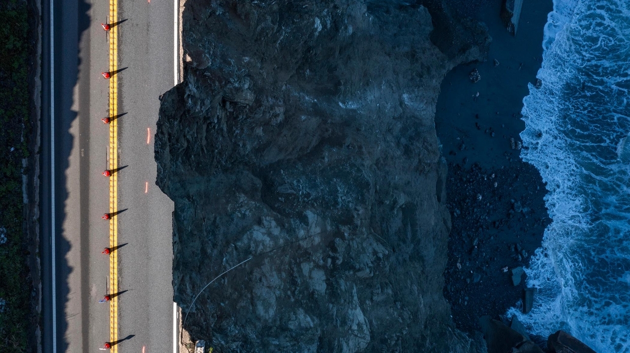Motorists creep along 1 lane after part of California's iconic Highway ...