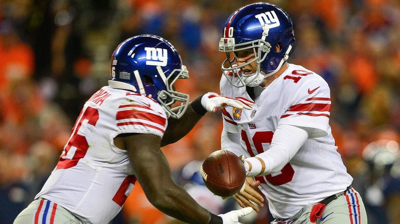 Eli Manning goes from throwing all over to run, run, run - Newsday