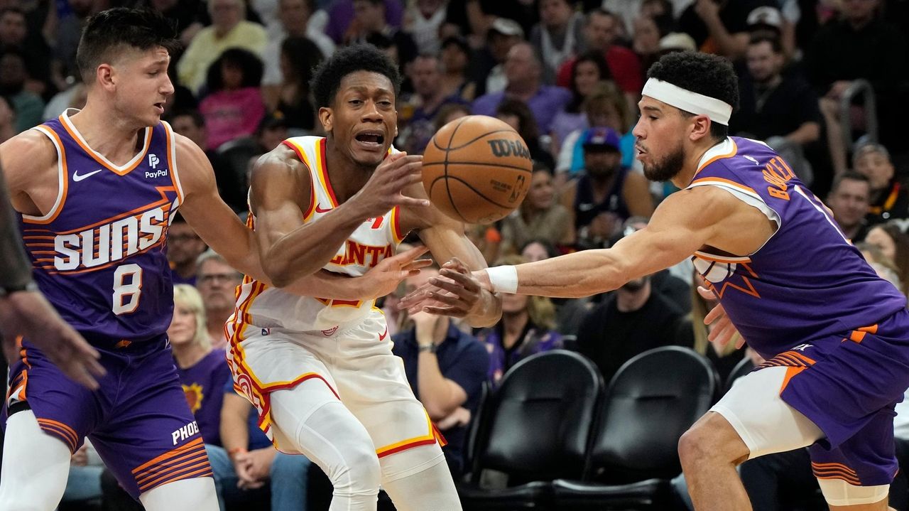 Devin Booker scores 30 points, Suns get hot from 3-point range to beat Hawks 128-115 - Newsday