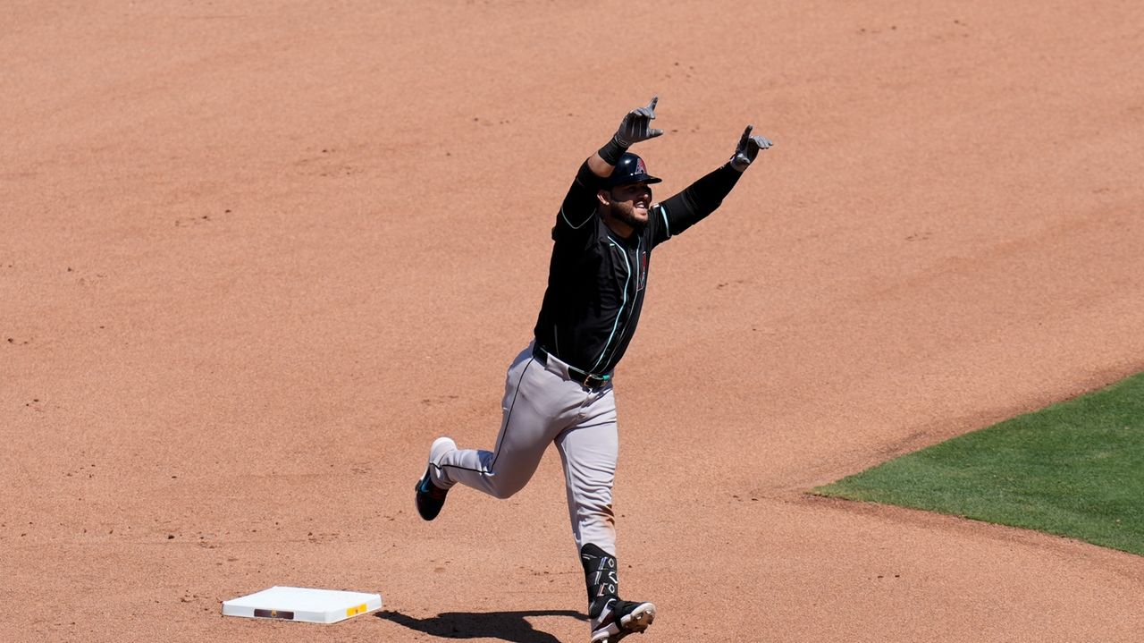 Eugenio Suárez homers, doubles and has 5 RBIs in the Diamondbacks' 9-1 ...