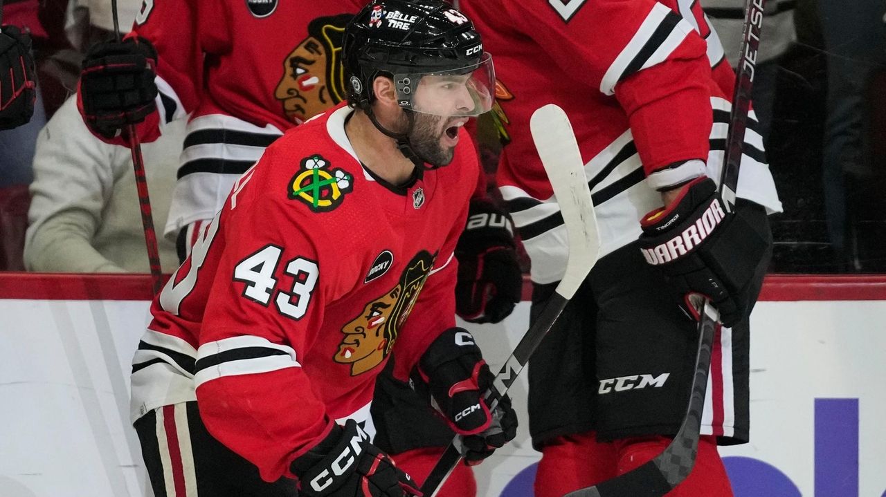 Blackwell helps the Blackhawks beat the Flames 4-3 in first game ...