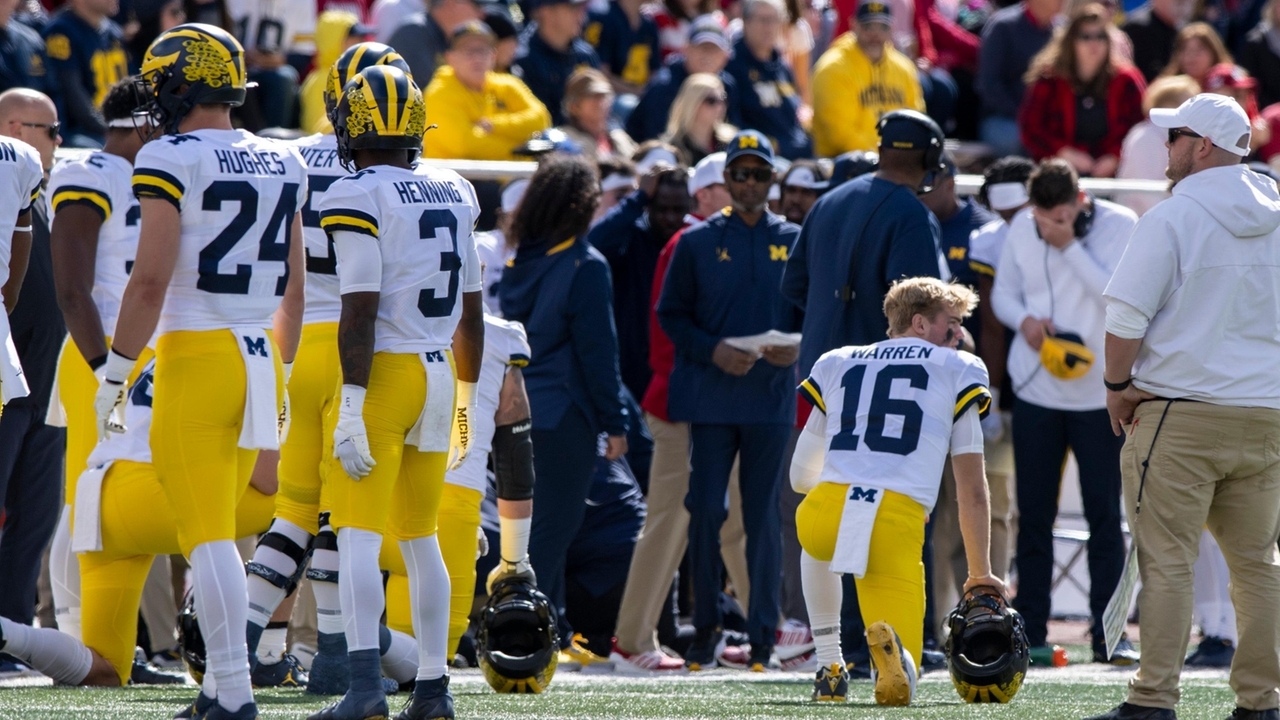 Michigan rallies to beat Indiana after assistant Mike Hart taken to ...