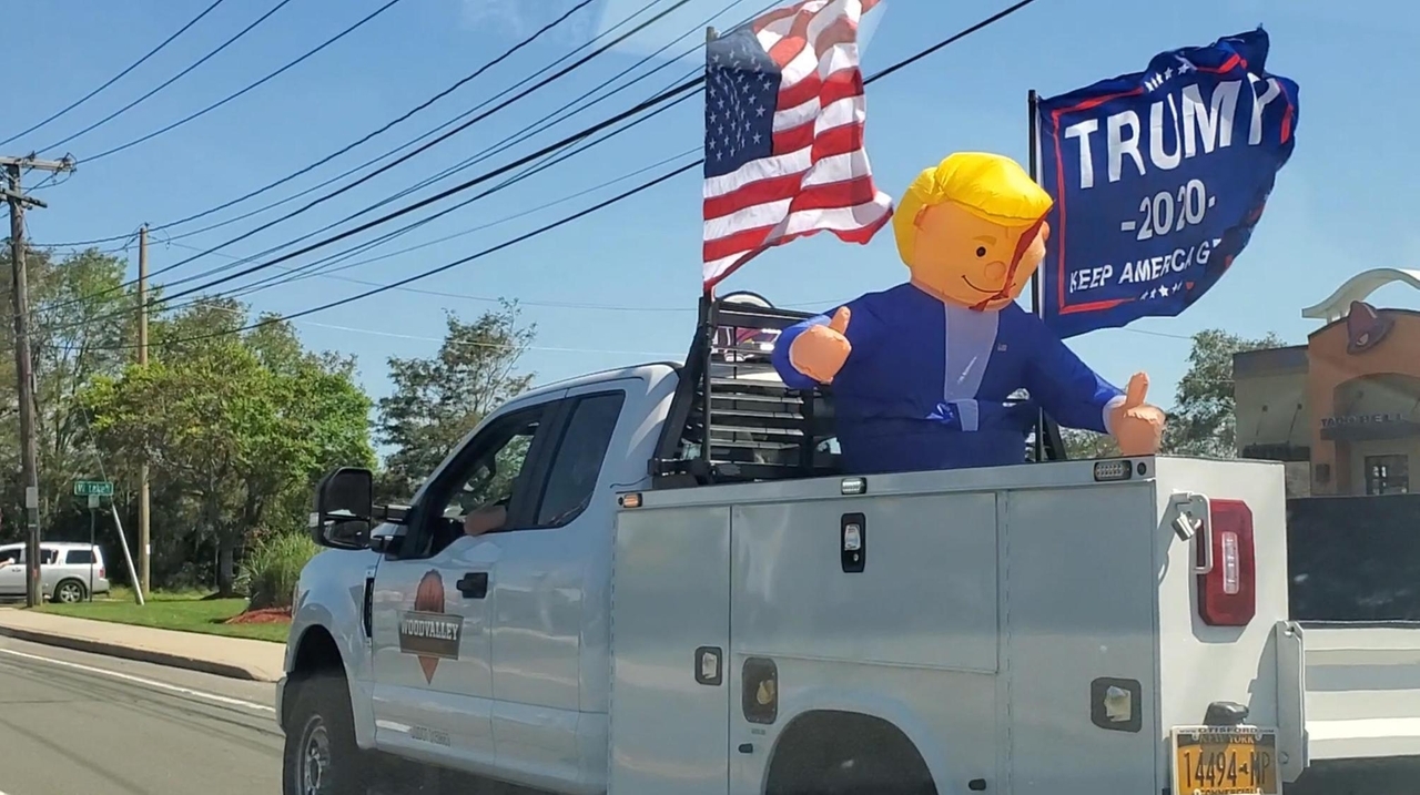 Trump supporters wave their flags in car parade from Copiague to ...