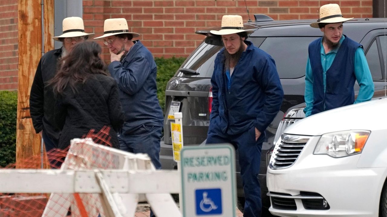 Husband of slain pregnant Amish woman testifies his young children told ...