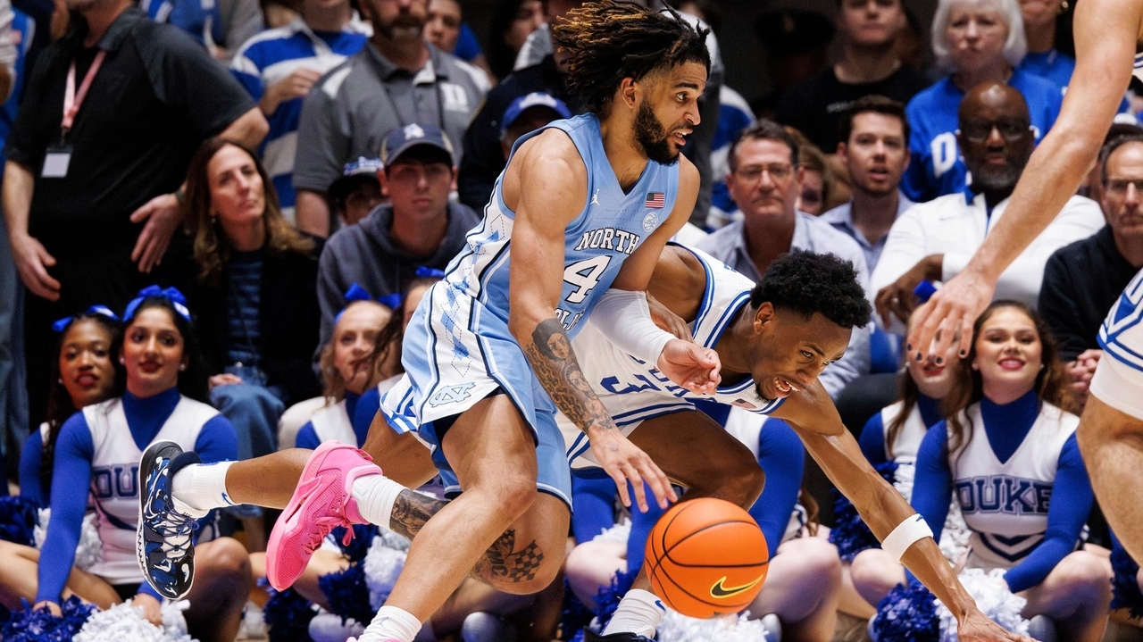 UNC's RJ Davis and Hubert Davis honored as ACC's top player, coach ...