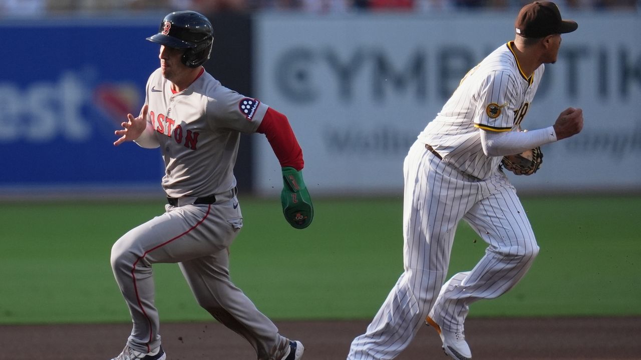 Red Sox score go-ahead run on Machado's failed hidden ball trick - Newsday
