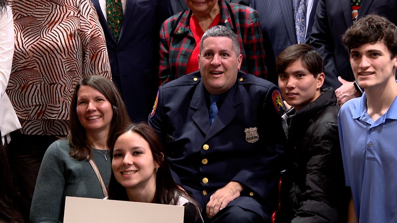 Nassau honors Officer Wayne Resnick, who was forced to stop working ...