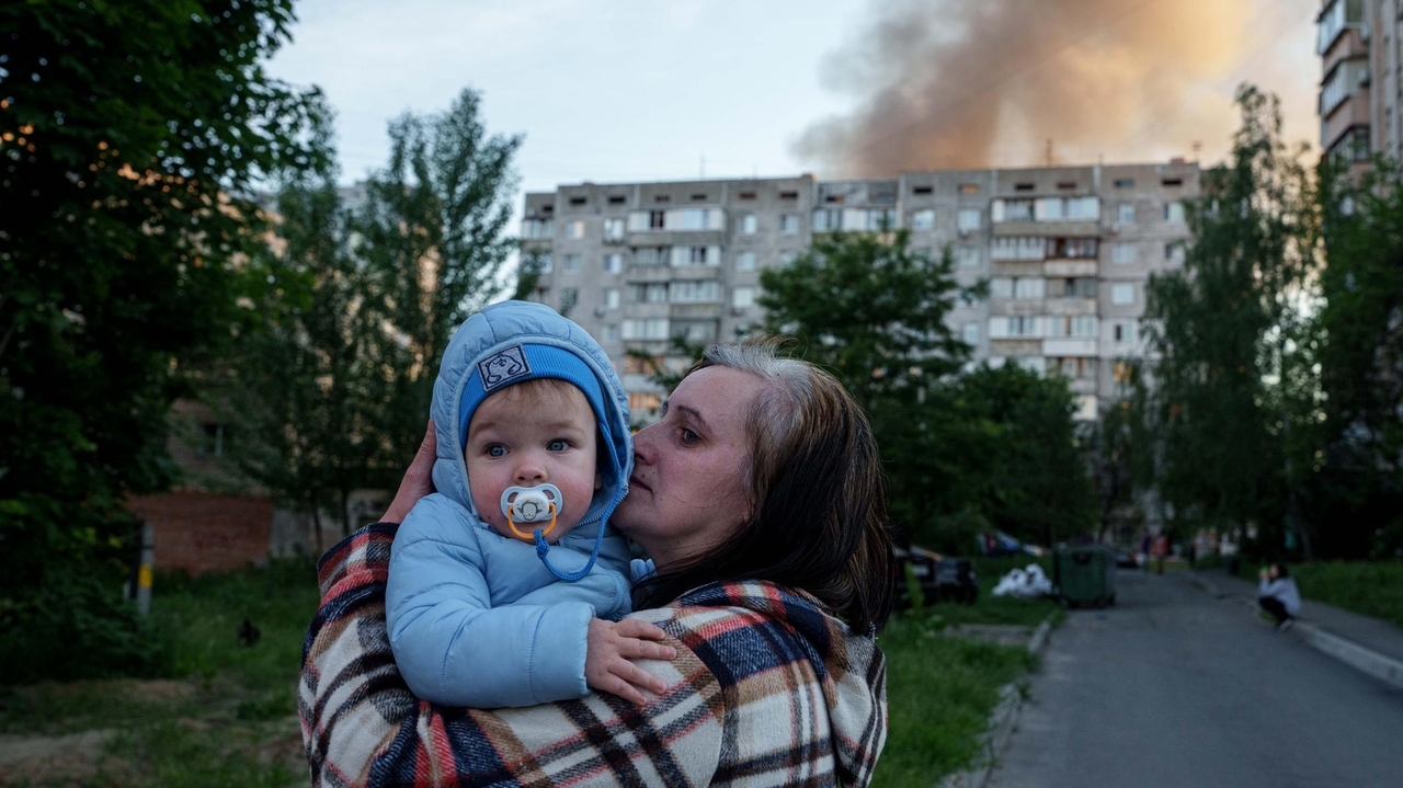 Russian attack on Ukraine kills at least 14 and traps others in damaged ...