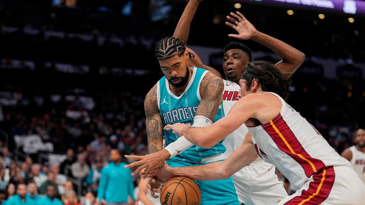 Jimmy Butler's scores 13 of 26 points in fourth quarter as Heat hold off pesky Hornets 114-106 ...