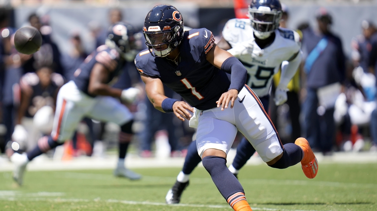 Fields throws TD passes to Moore and Herbert as the Bears beat the ...