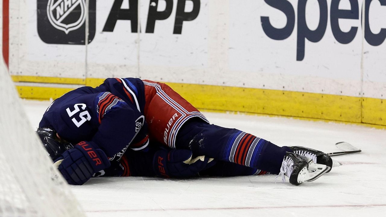 Rangers' Ryan Lindgren leaves with left leg injury in second period ...