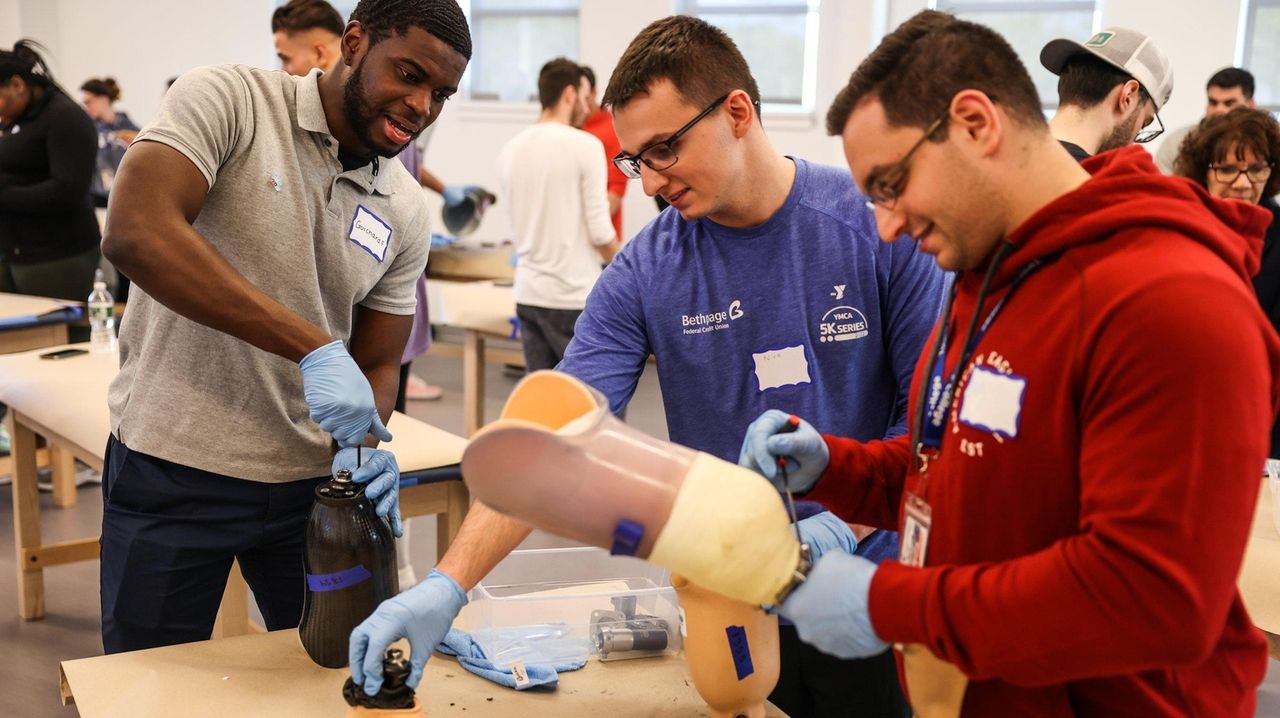 Touro University students take apart prosthetic limbs for reuse in ...