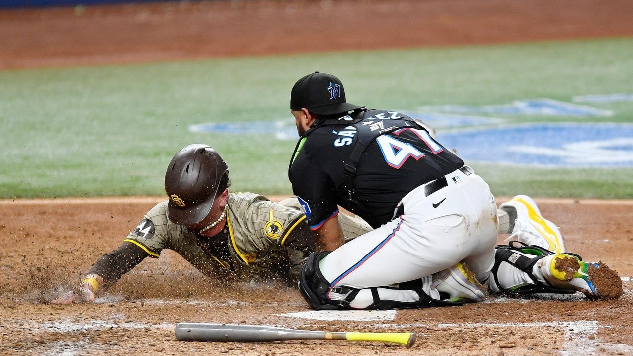 Manny Machado's 2-run double in the 10th inning helps Padres rally past ...