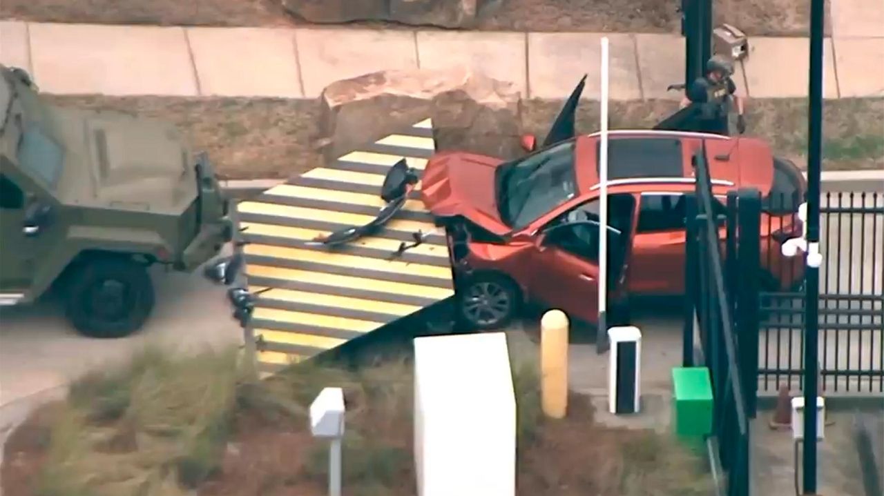 FBI says a driver rammed a vehicle into the front gate of its Atlanta ...