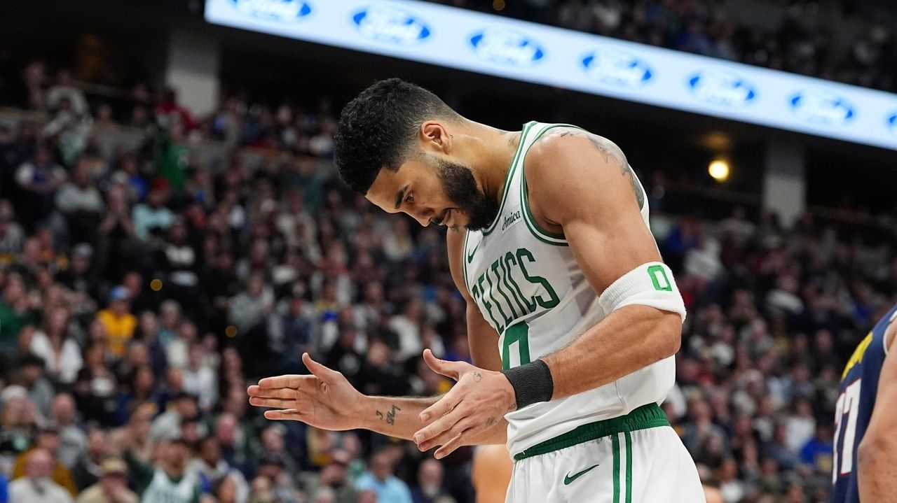 Jayson Tatum scores 29, Porzingis adds 25 as Celtics hold off depleted Nuggets 118-106 - Newsday